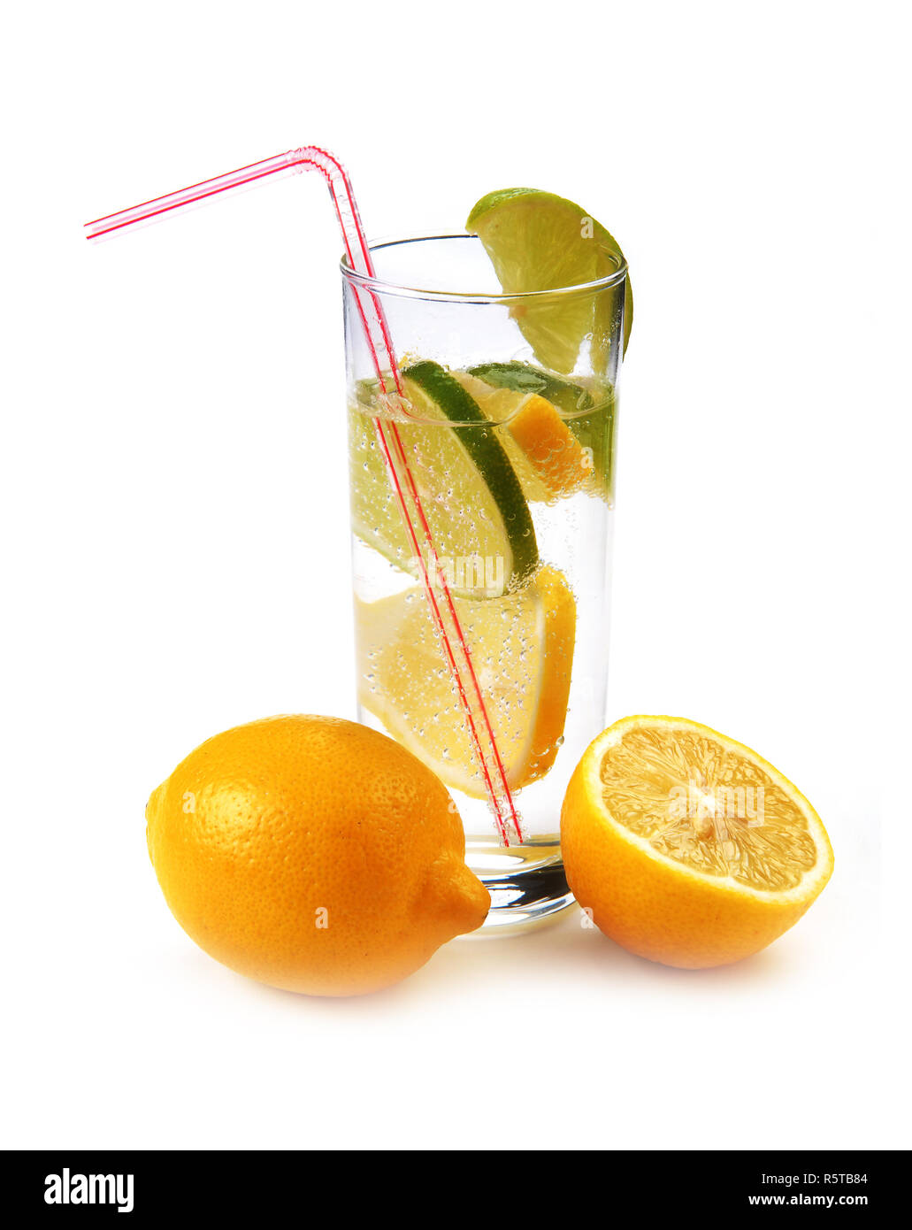 Lemon, lime and lemonade in a glass Stock Photo - Alamy