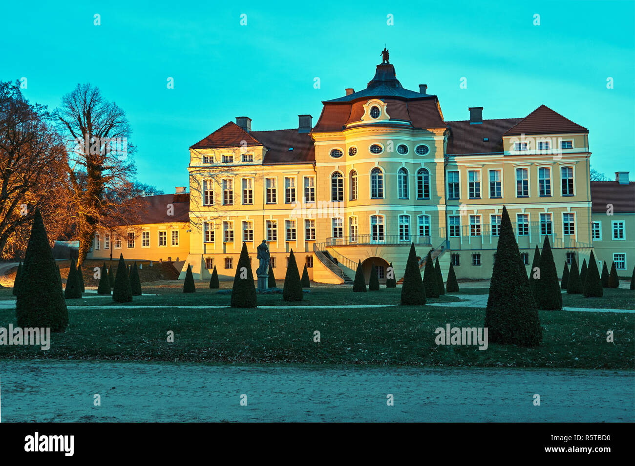 night view of the illuminated elevation of the baroque historic palace ...