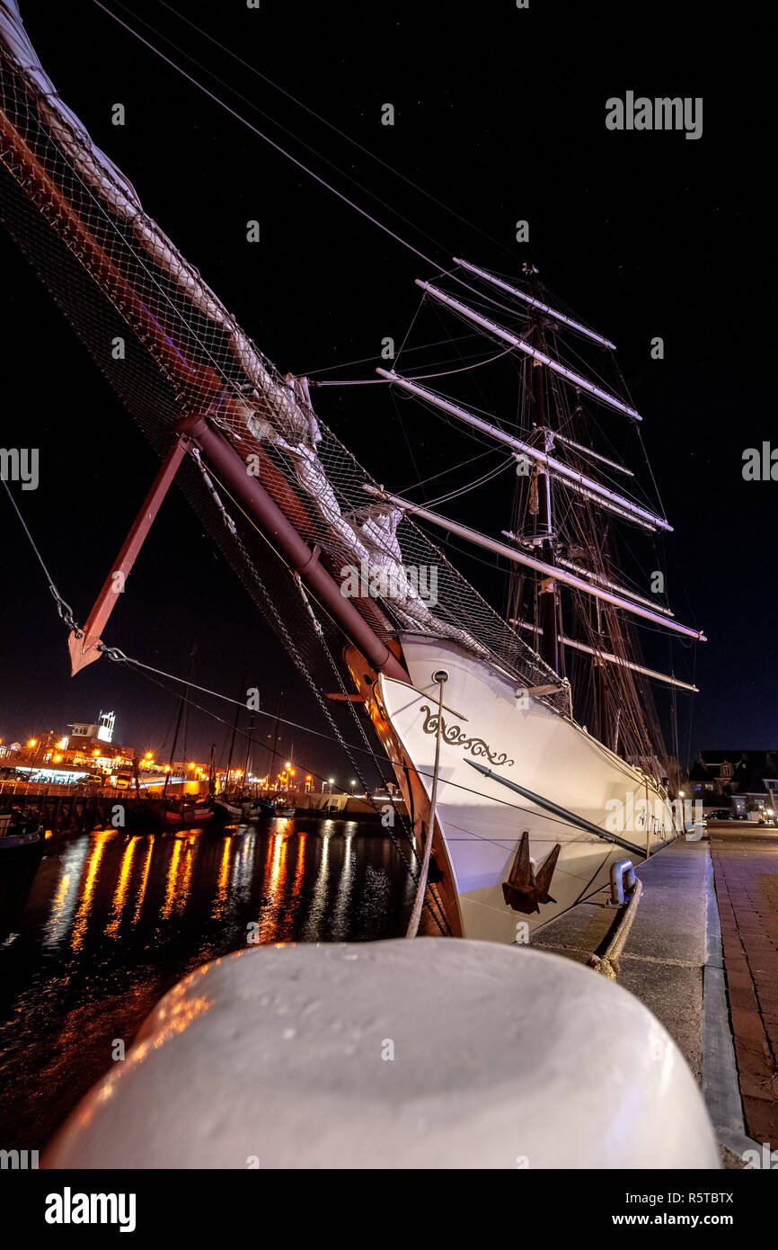 Old classic sailing ship with imposing masts full of sails and a ...