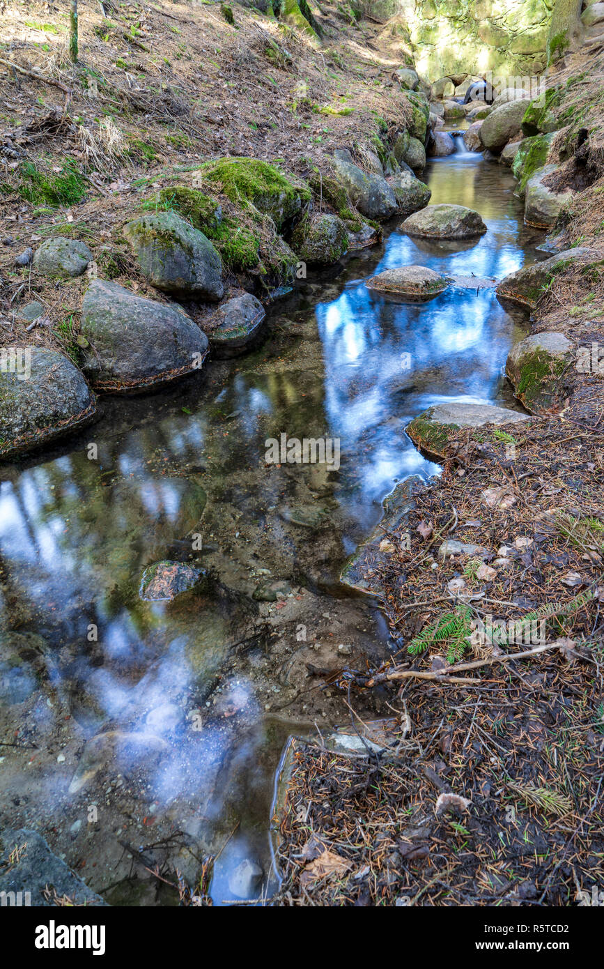 large granite rock single in nature environment isolated from other ...