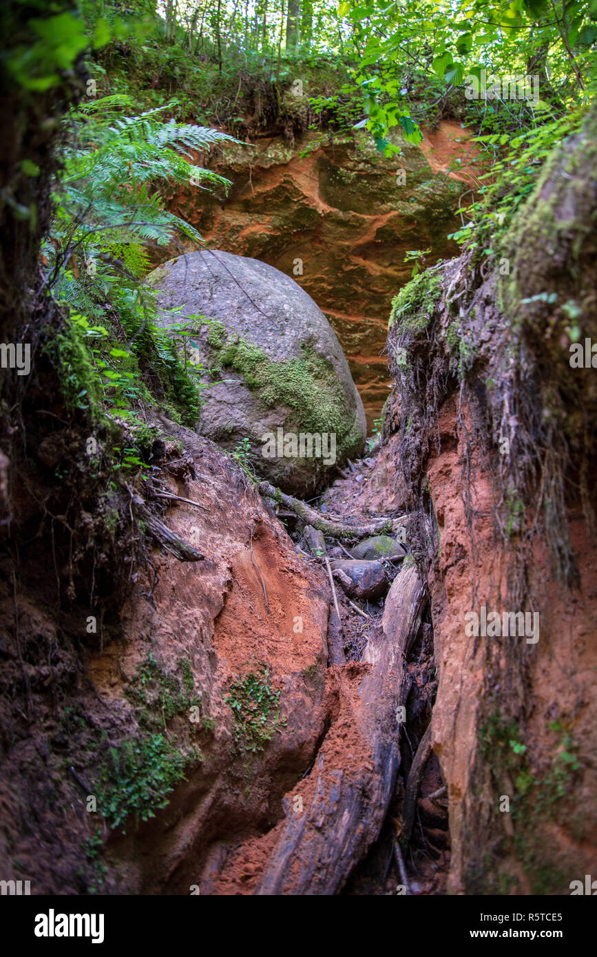 large granite rock single in nature environment isolated from other ...