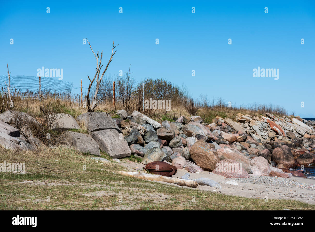 large granite rock single in nature environment isolated from other ...