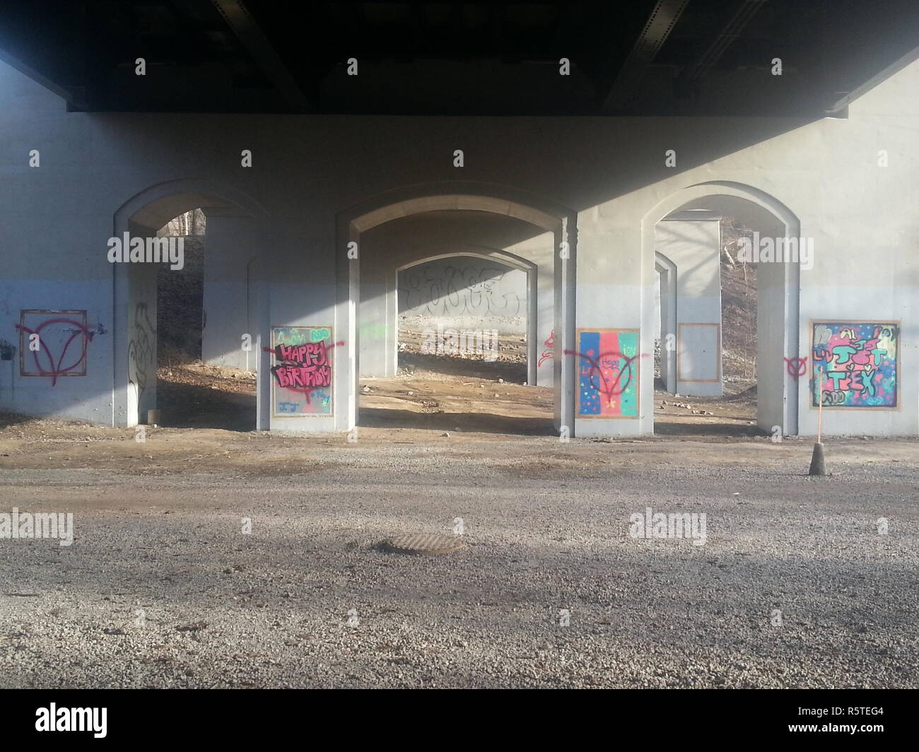Some street art under a bridge Stock Photo - Alamy