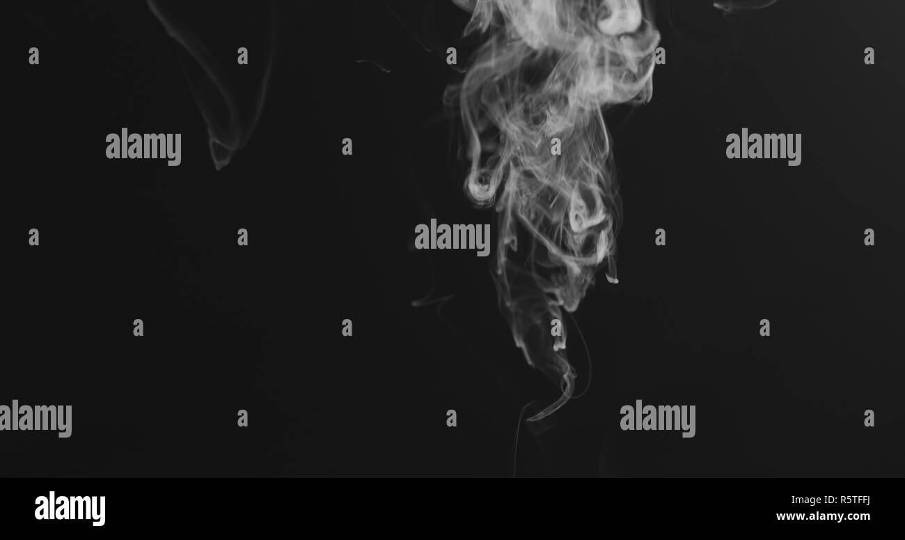 closeup vapor stream rises from bottom center on black background Stock ...