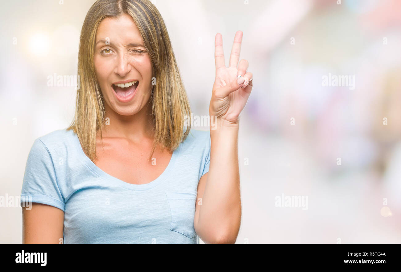 Hispanic beautiful woman winking face hi-res stock photography and ...