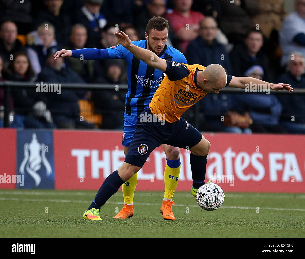 Slough Town's Lee Togwell (front) and Gillingham's Dean Parrett in ...