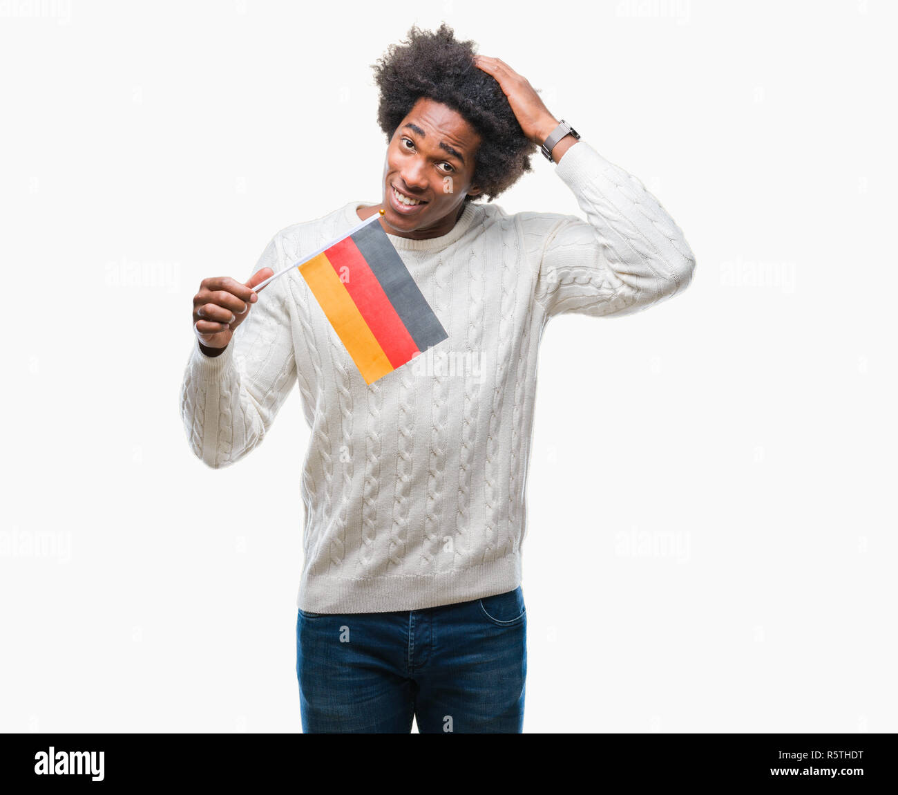 Afro american man flag of Germany over isolated background stressed ...