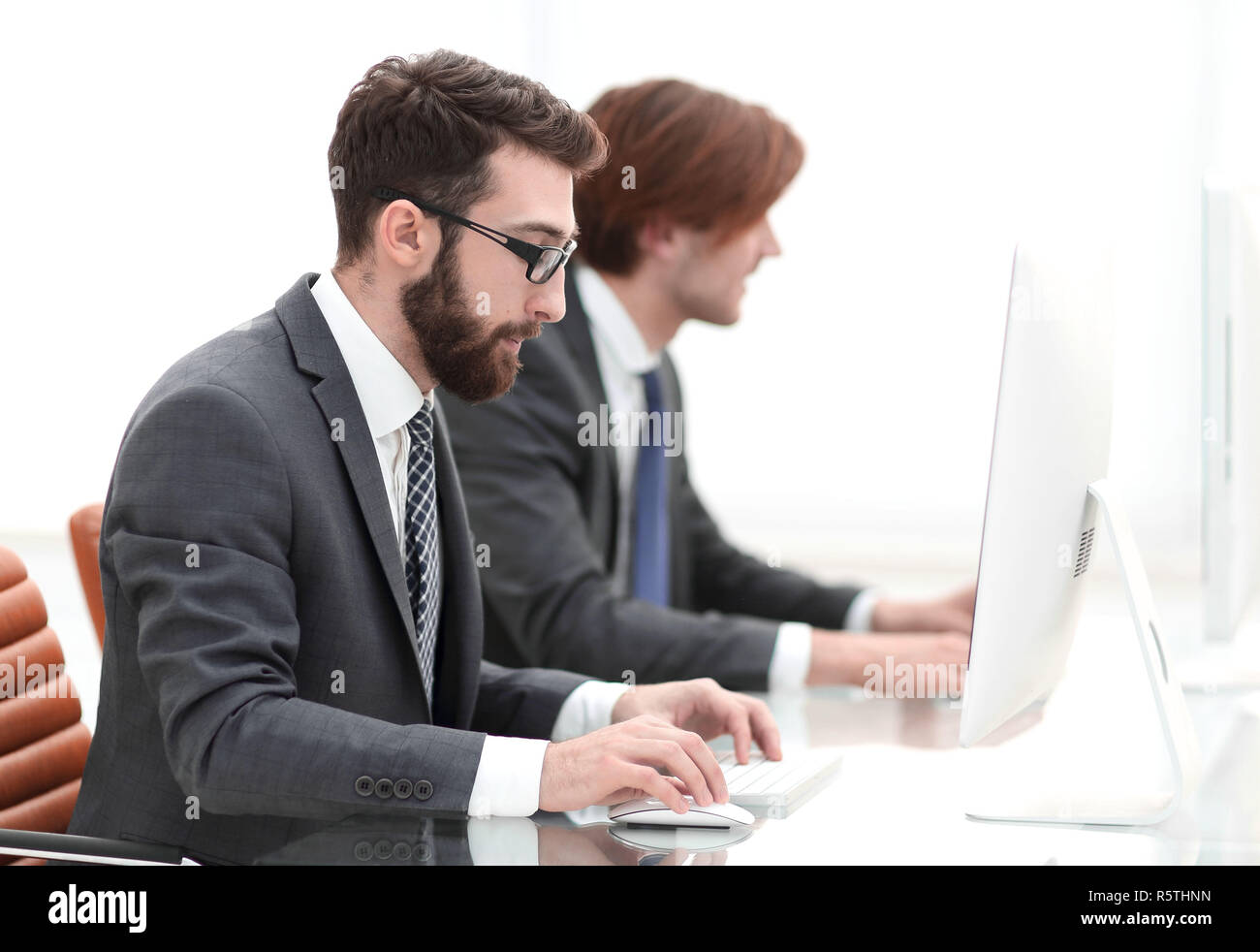 Company employees working in software development Stock Photo - Alamy