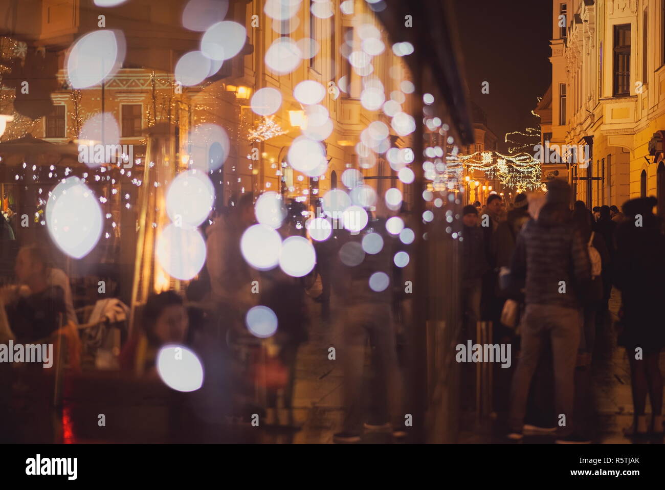 Blurred Street Lights and Crowd at Night Stock Photo - Alamy