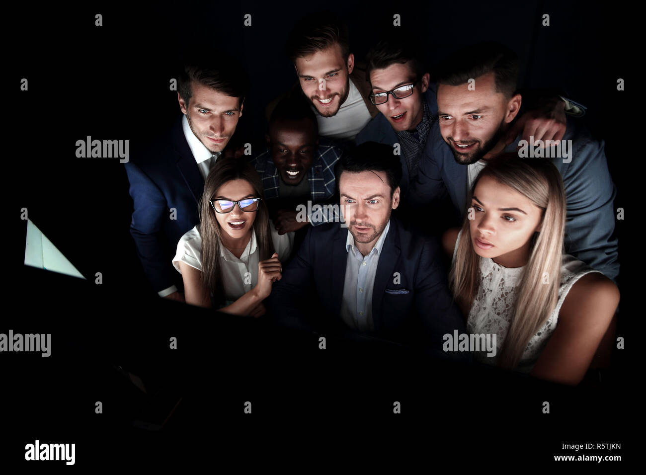 corporate team of employees looking at the computer screen Stock Photo ...