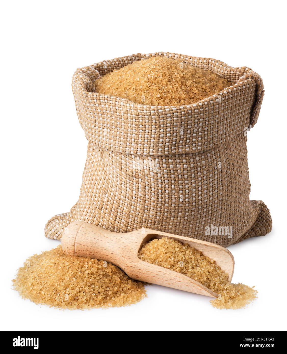 brown cane sugar in burlap bag and wooden scoop isolated on white ...