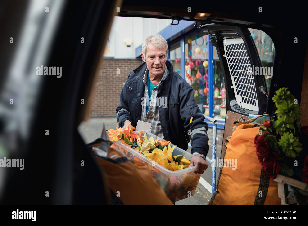 Events businessman is filling his car with props for a client Stock ...