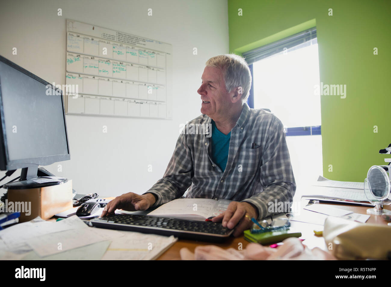 Senior Working From Home Stock Photo - Alamy