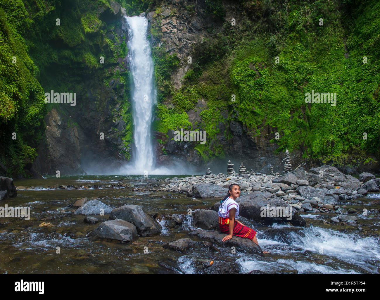 Girl from Ifugao Minority near a waterfall in Batad the Philippines ...