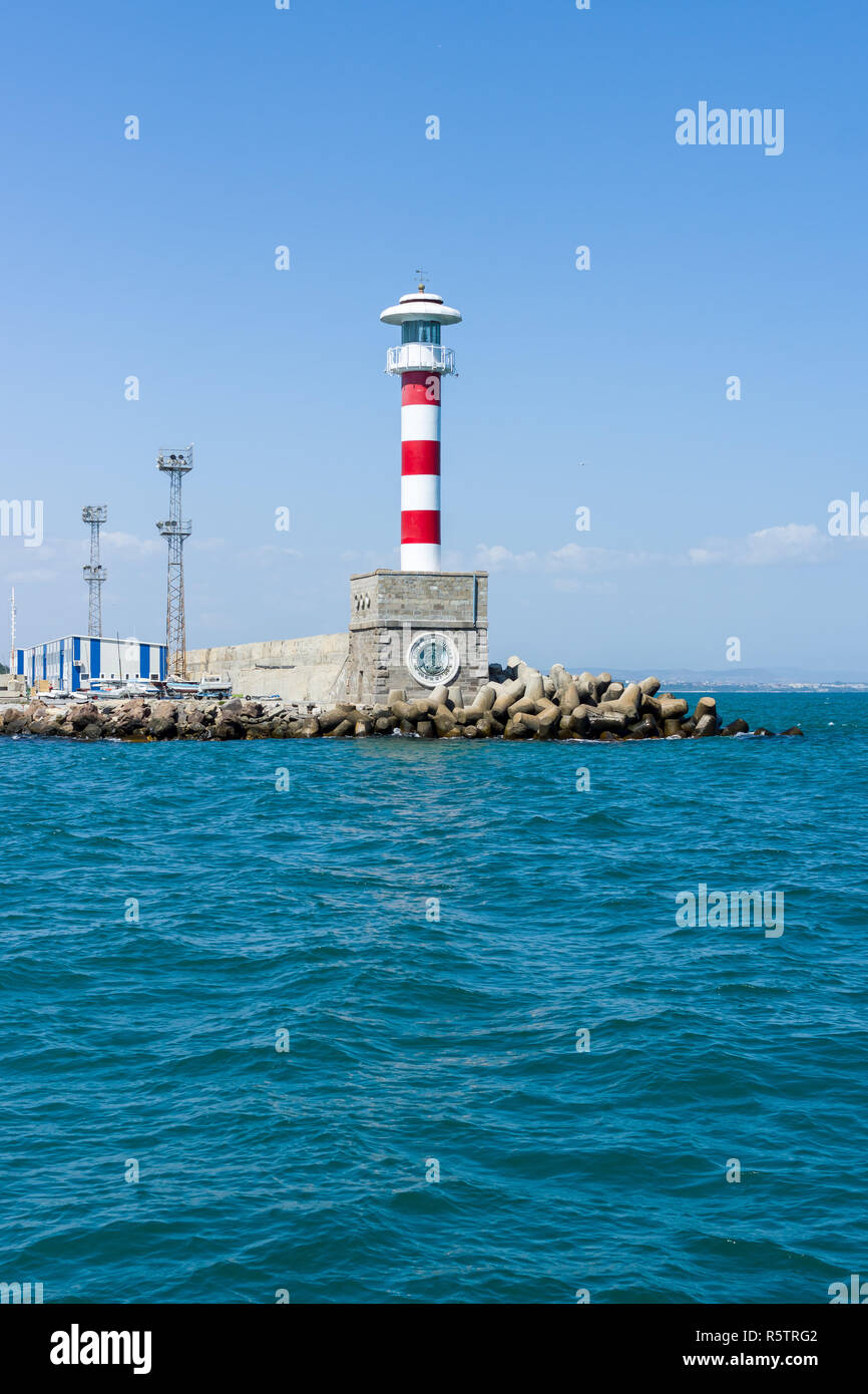 Lighthouse at the entrance to the water area of the sea port of Burgas ...