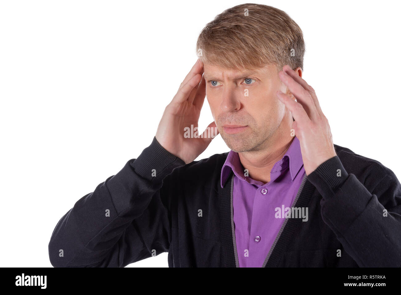 A man holds his hands on his head on white background Stock Photo - Alamy