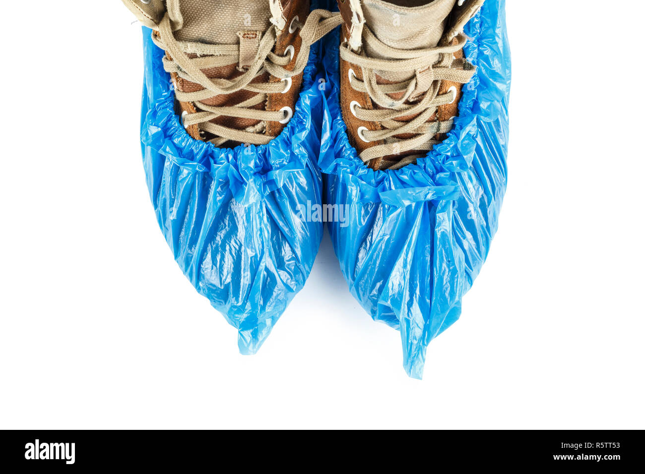 men's winter boots in blue boot covers isolated on white background ...