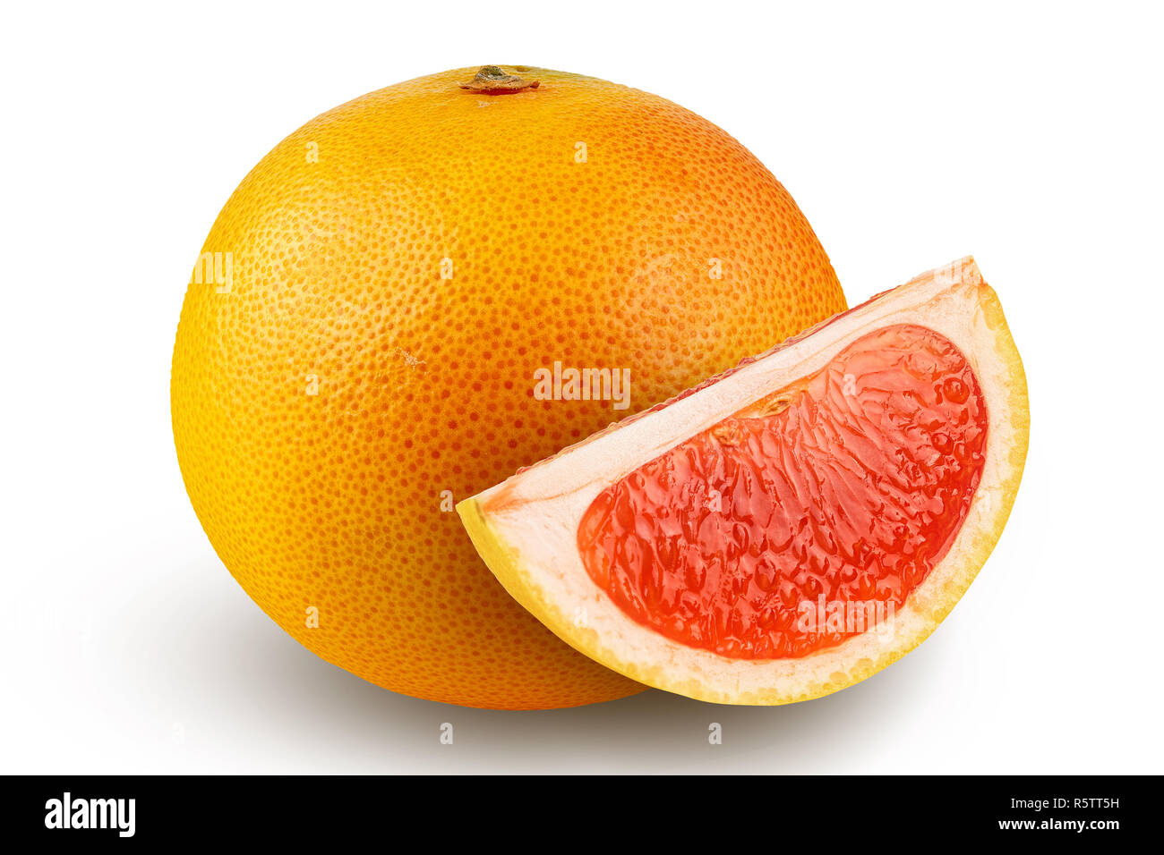 ripe grapefruit, whole and sliced, isolated on a white background ...