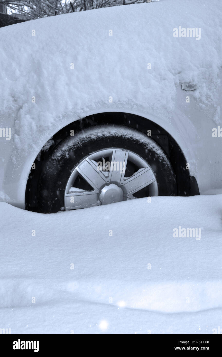 car wheel in the snow as a symbol of winter Stock Photo - Alamy