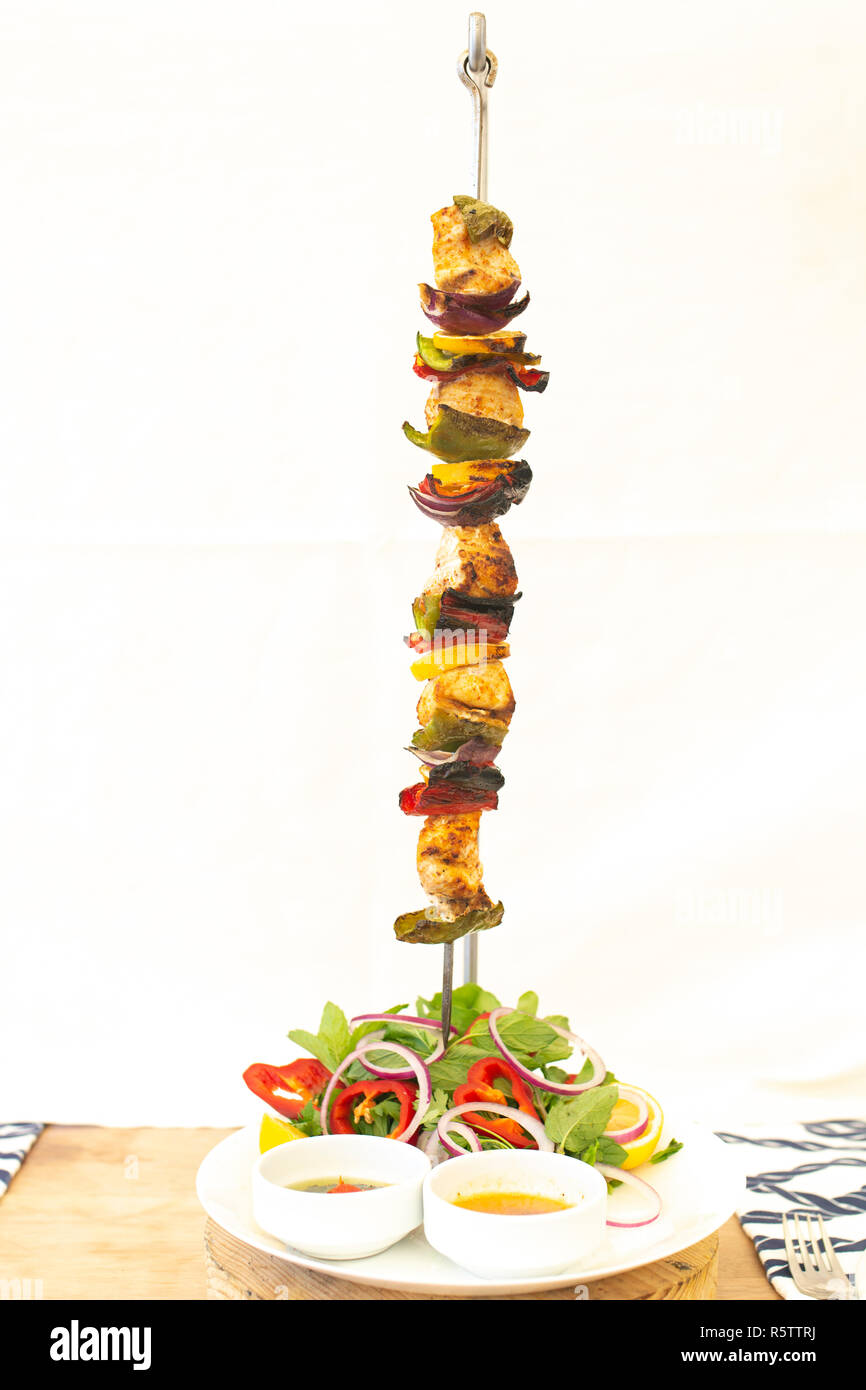 Mediterranean style fresh fish skewers shish Stock Photo - Alamy