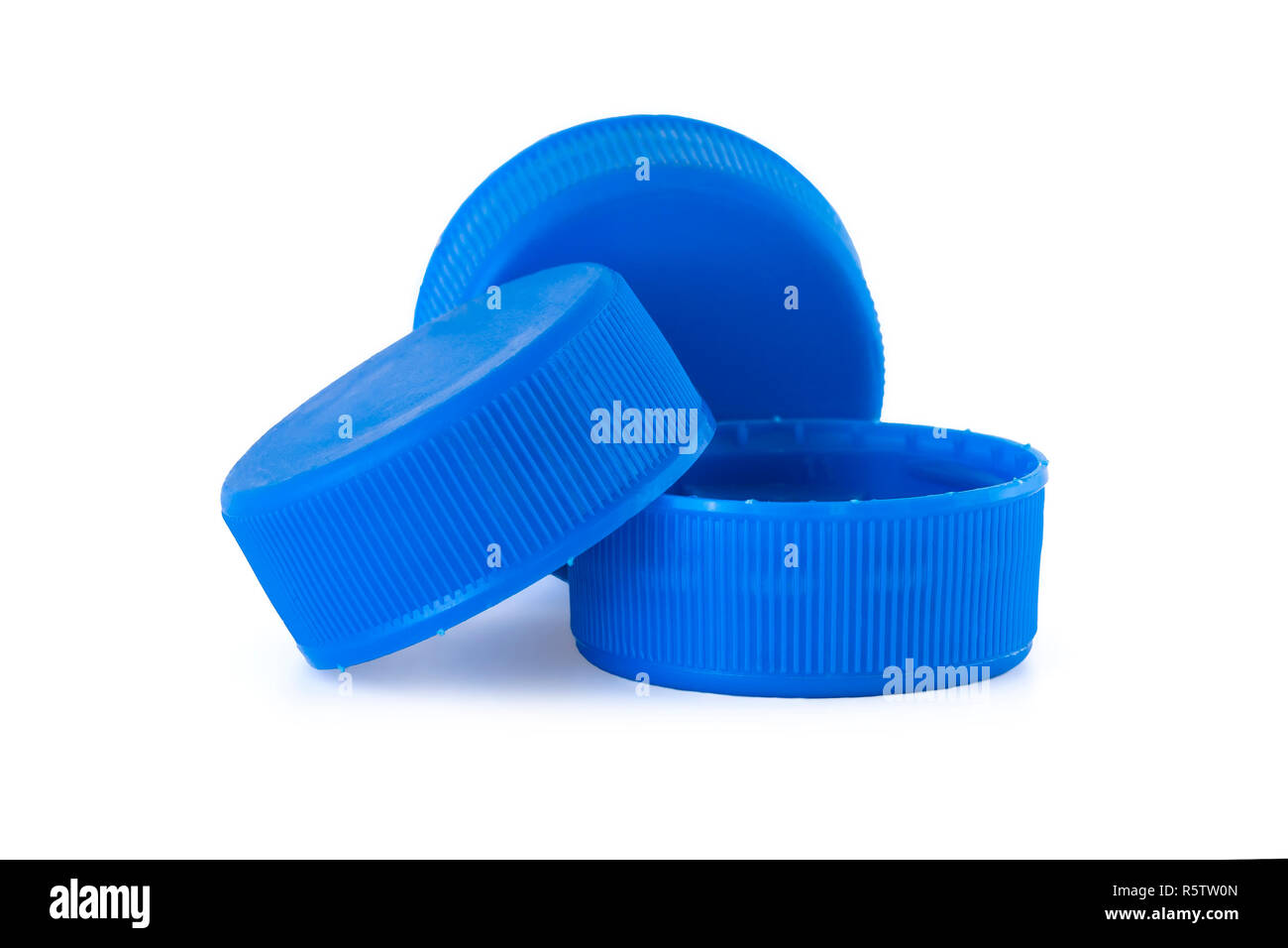 three blue plastic bottle caps Stock Photo - Alamy