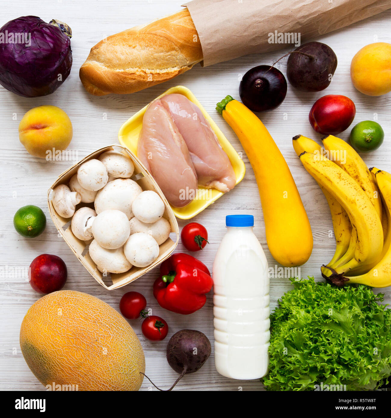 Set of various healthy food on white wooden surface, top view. Cooking ...