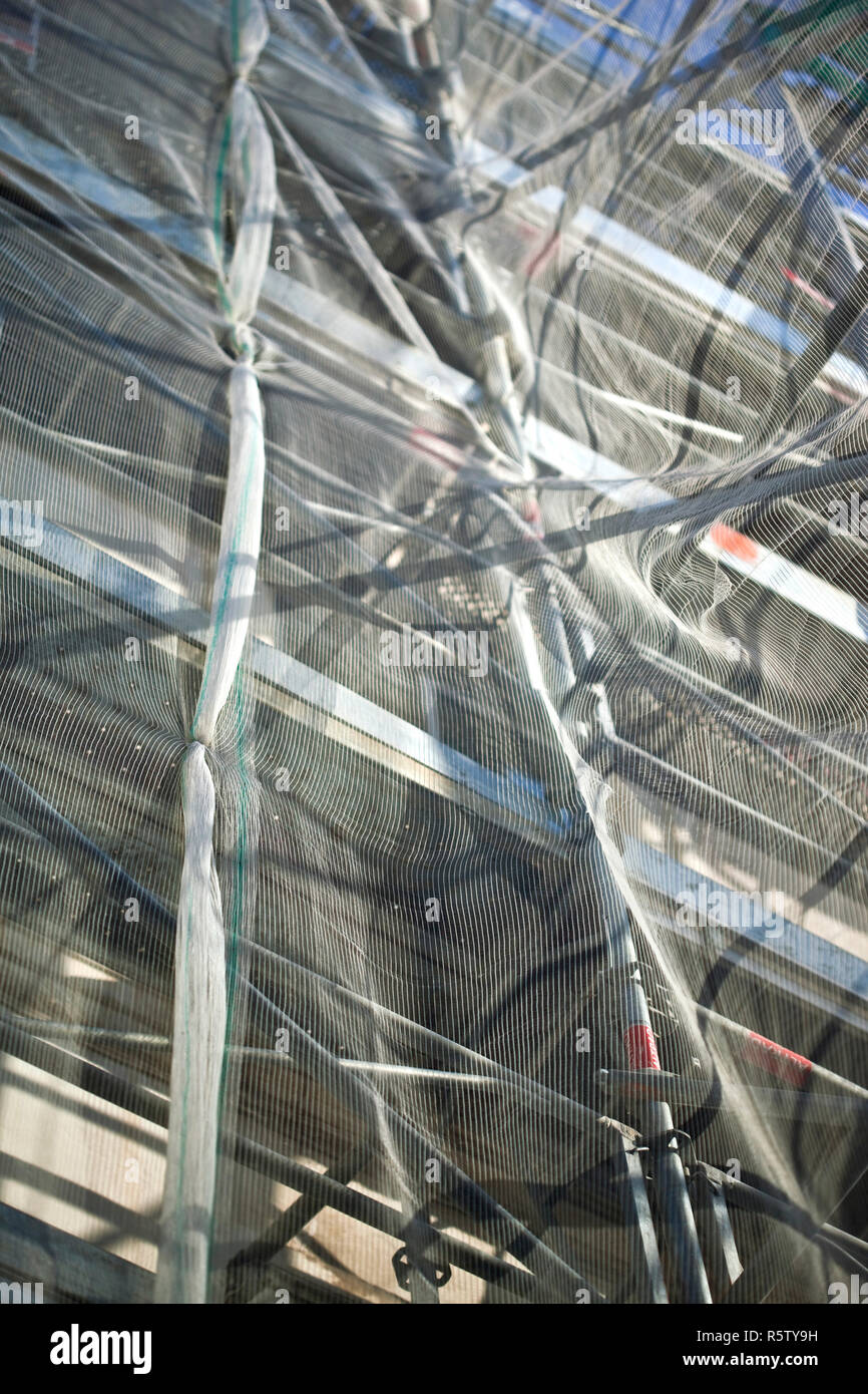 Net on a scaffolding Stock Photo - Alamy