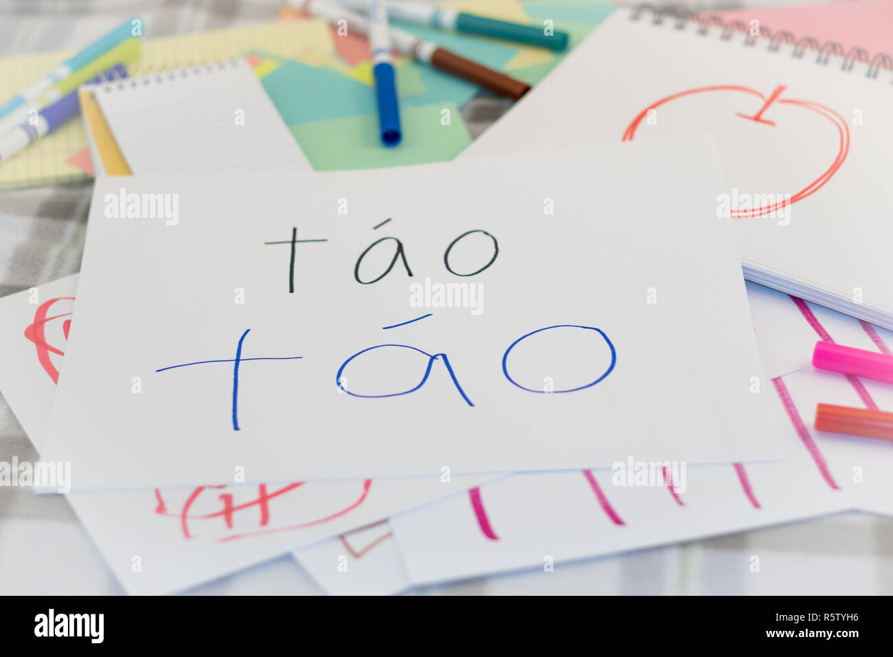 Vietnamese Kids Writing Name of the Fruits for Practice Stock Photo - Alamy