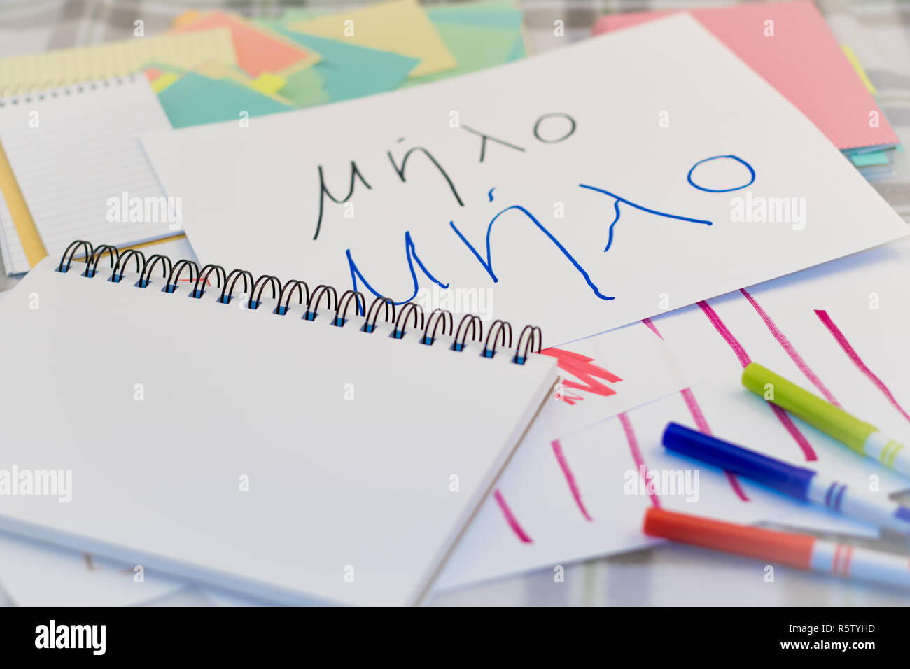 Greek Kids Writing Name of the Fruits for Practice Stock Photo - Alamy