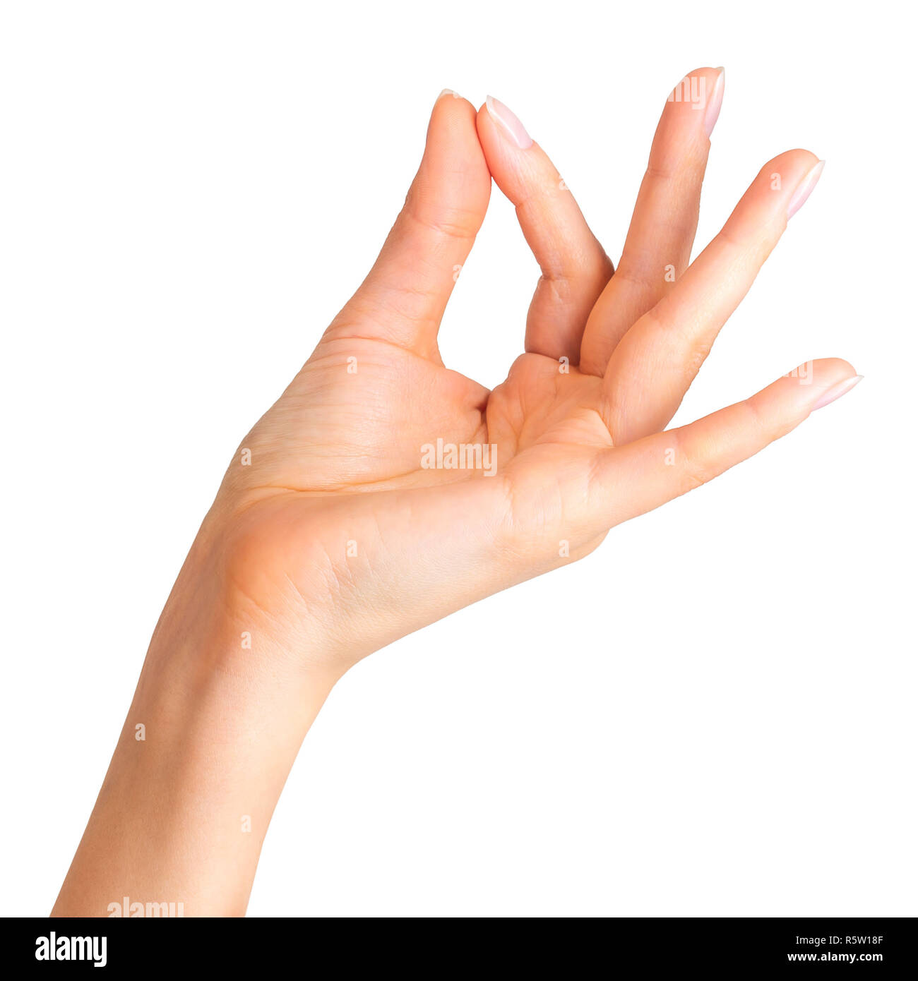 Woman hand holding something with two fingers Stock Photo - Alamy