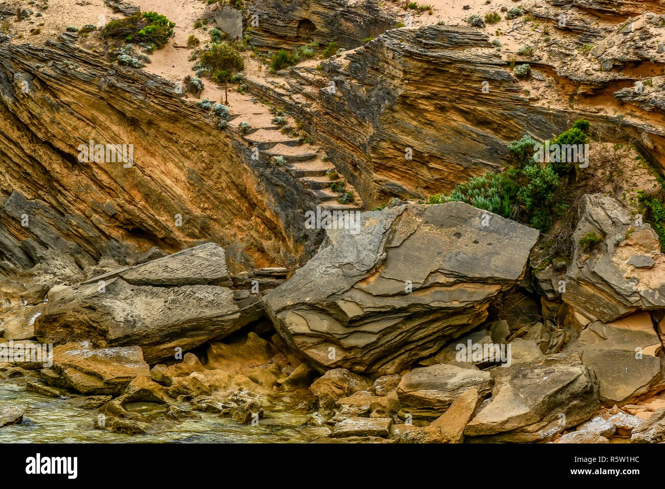 The sharp rocks on the Australian coast of the Pacific ocean Stock ...
