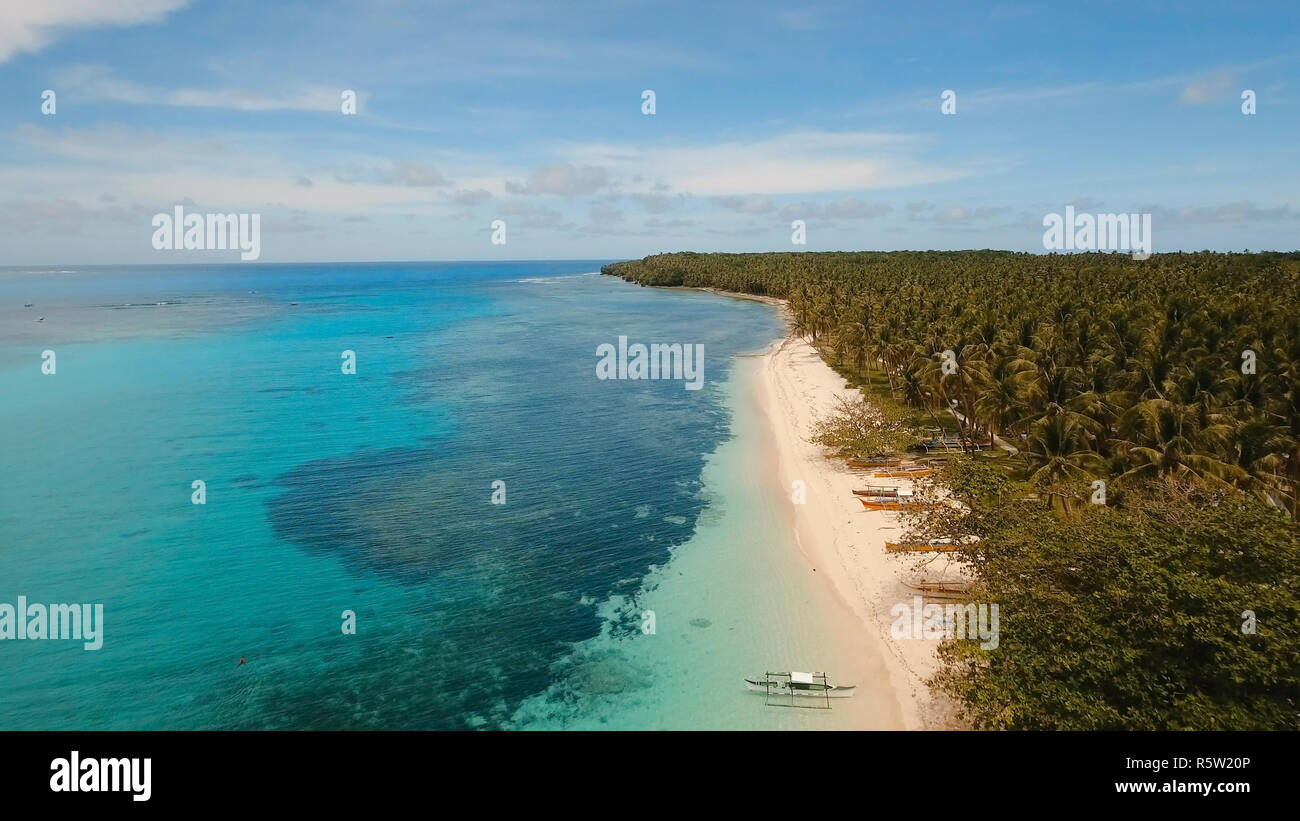 Aerial view of beautiful tropical island Daco with white sand beach ...