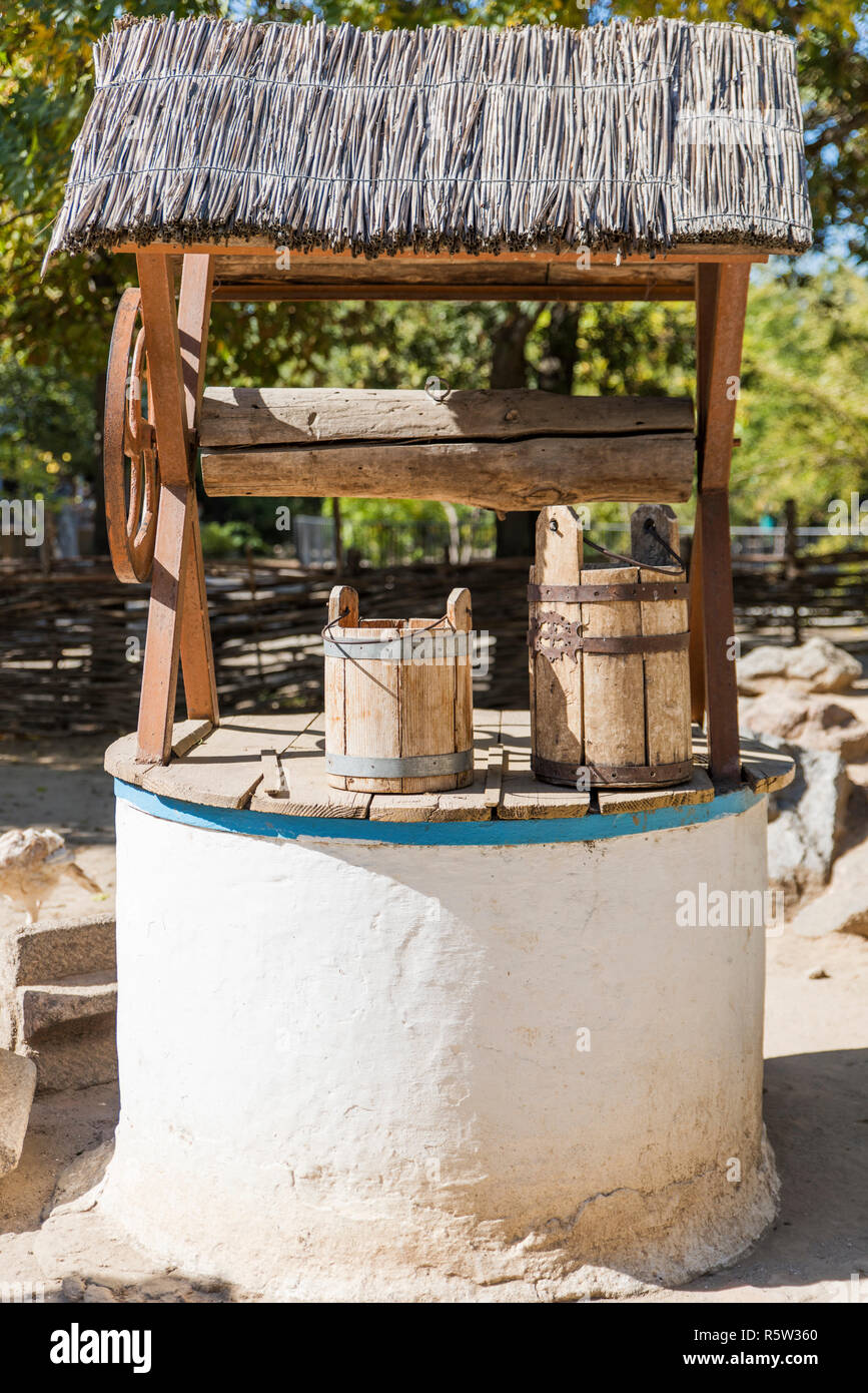 Traditional stone village drinking well hi-res stock photography and ...