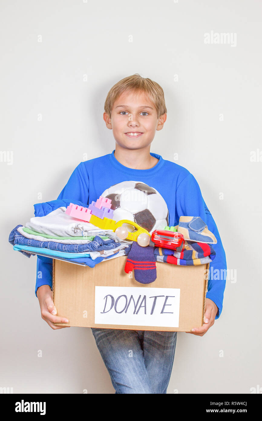 Child donation box toys hi-res stock photography and images - Alamy