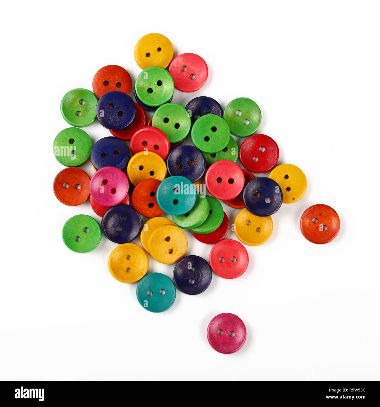 Mix of round colorful sewing buttons on white Stock Photo - Alamy