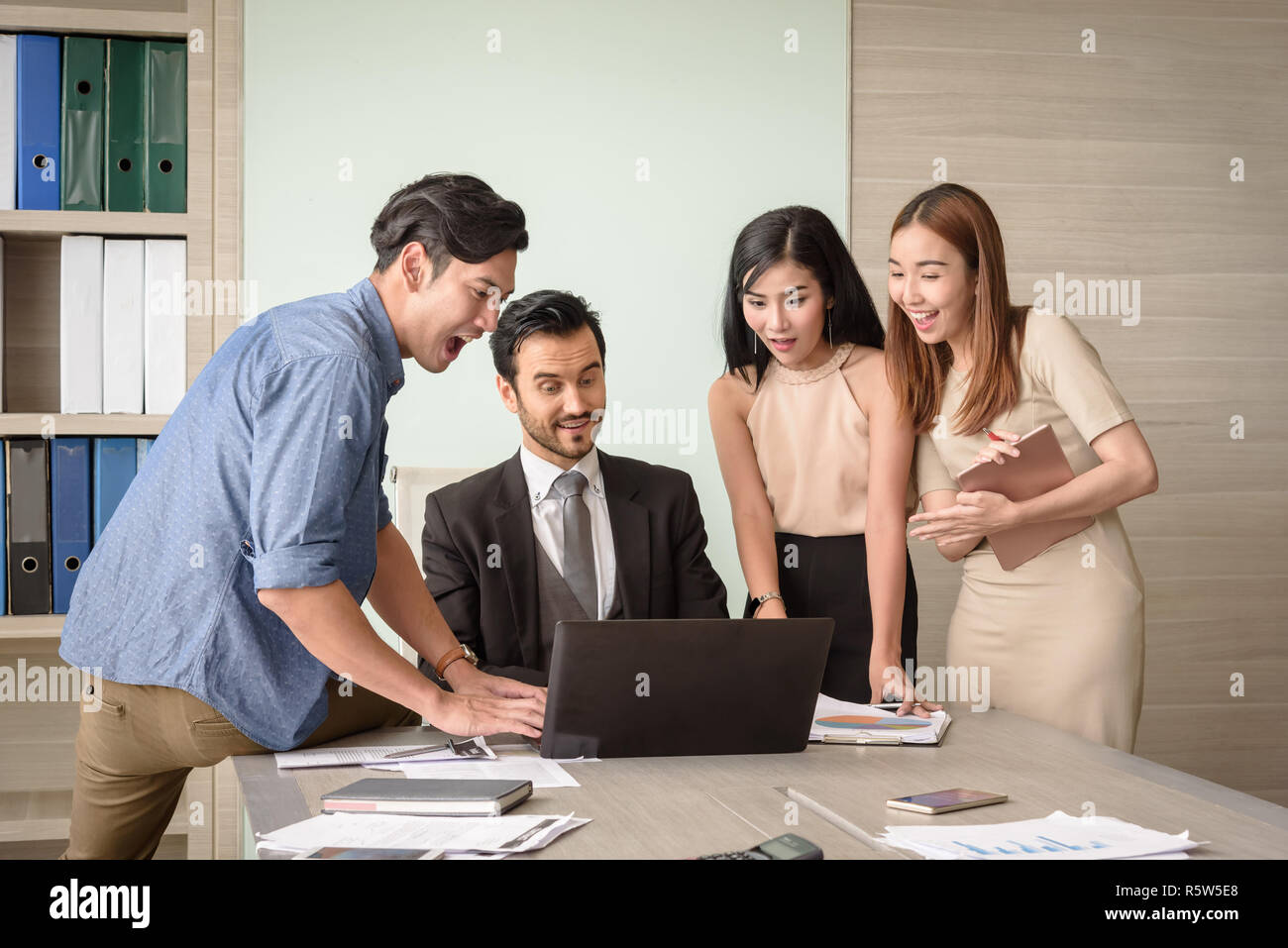 Business people happy and surprising, successful teamwork concept Stock Photo - Alamy