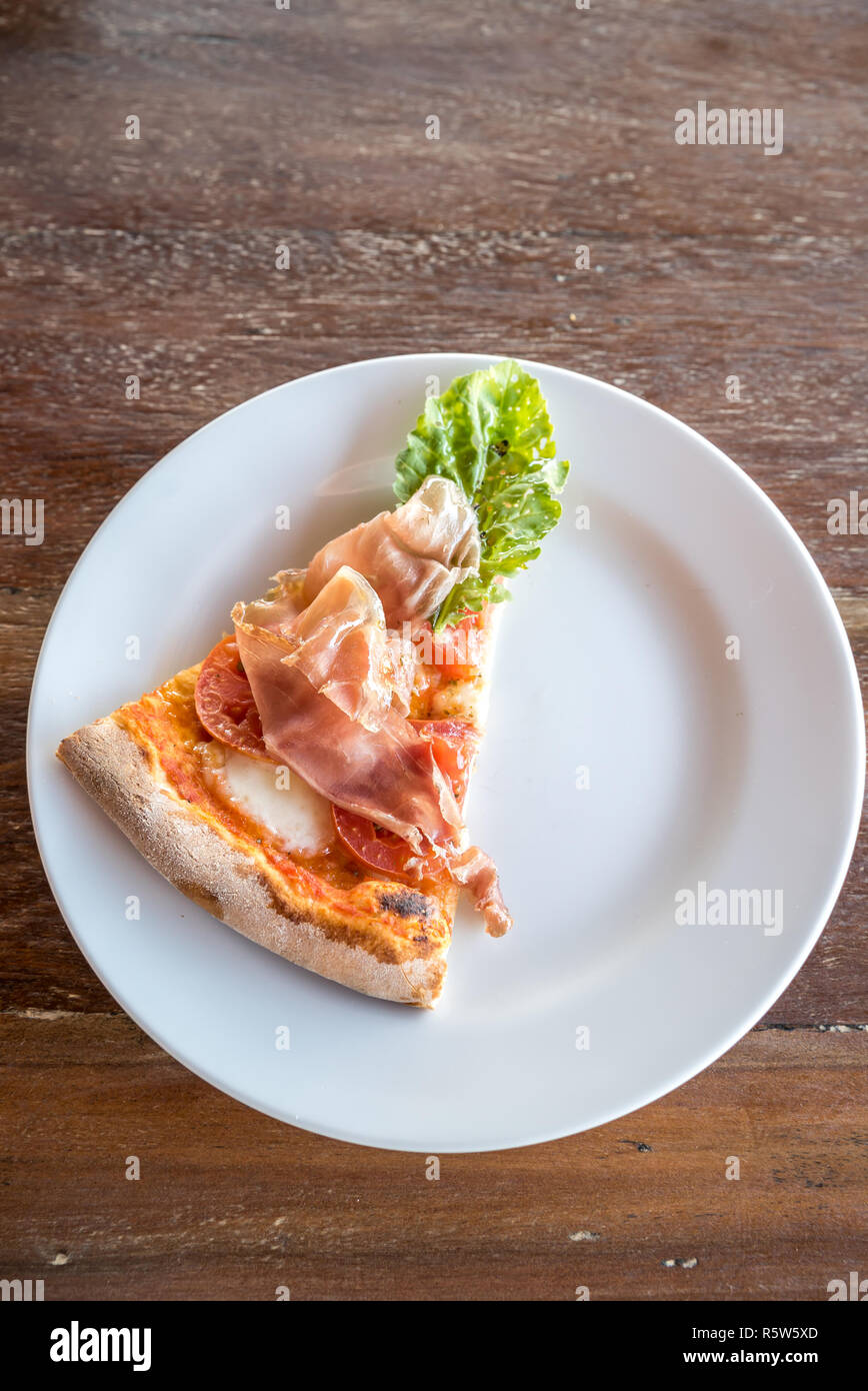 pizza parma ham piece Stock Photo - Alamy