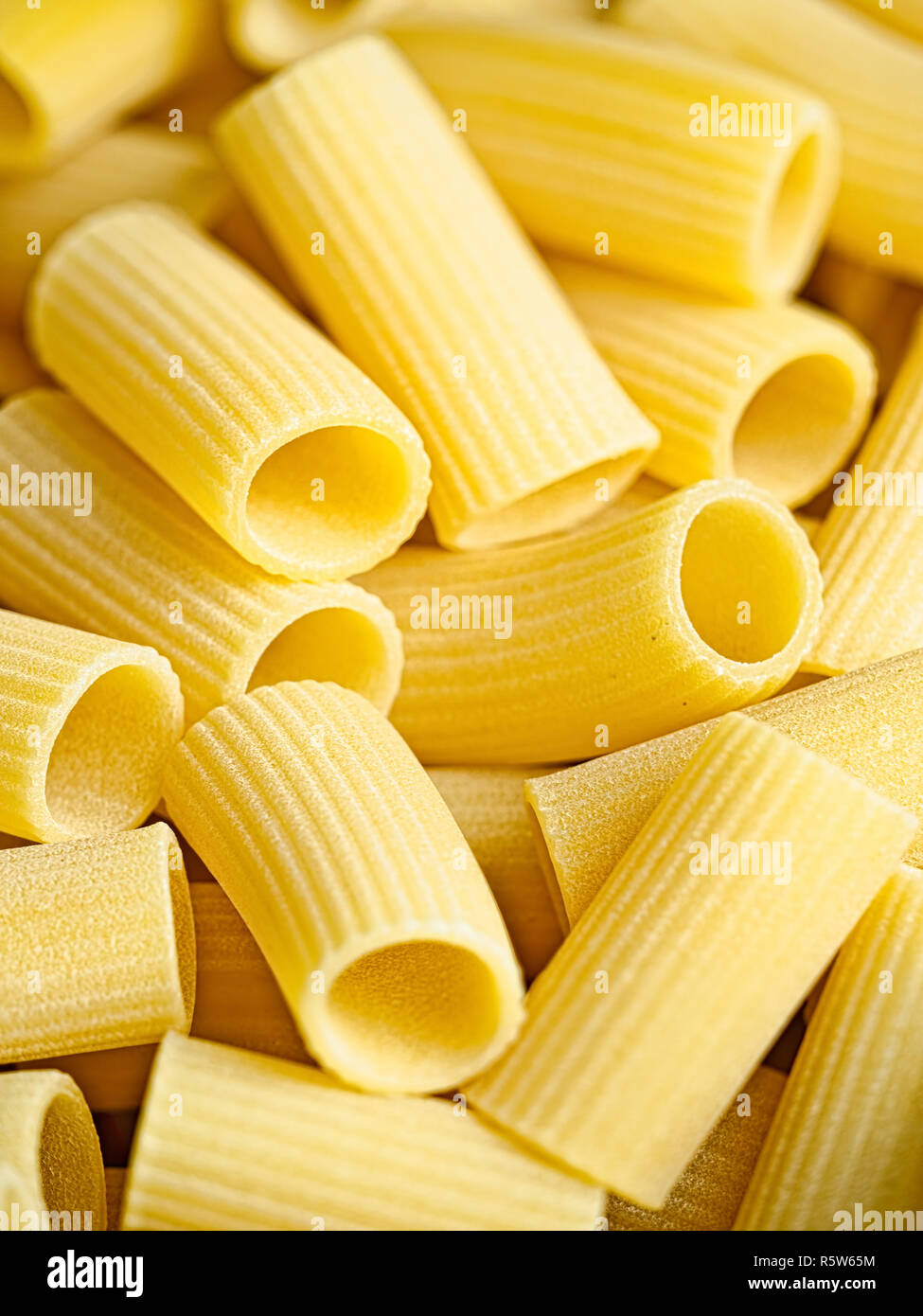 uncooked italian rigatoni pasta Stock Photo - Alamy