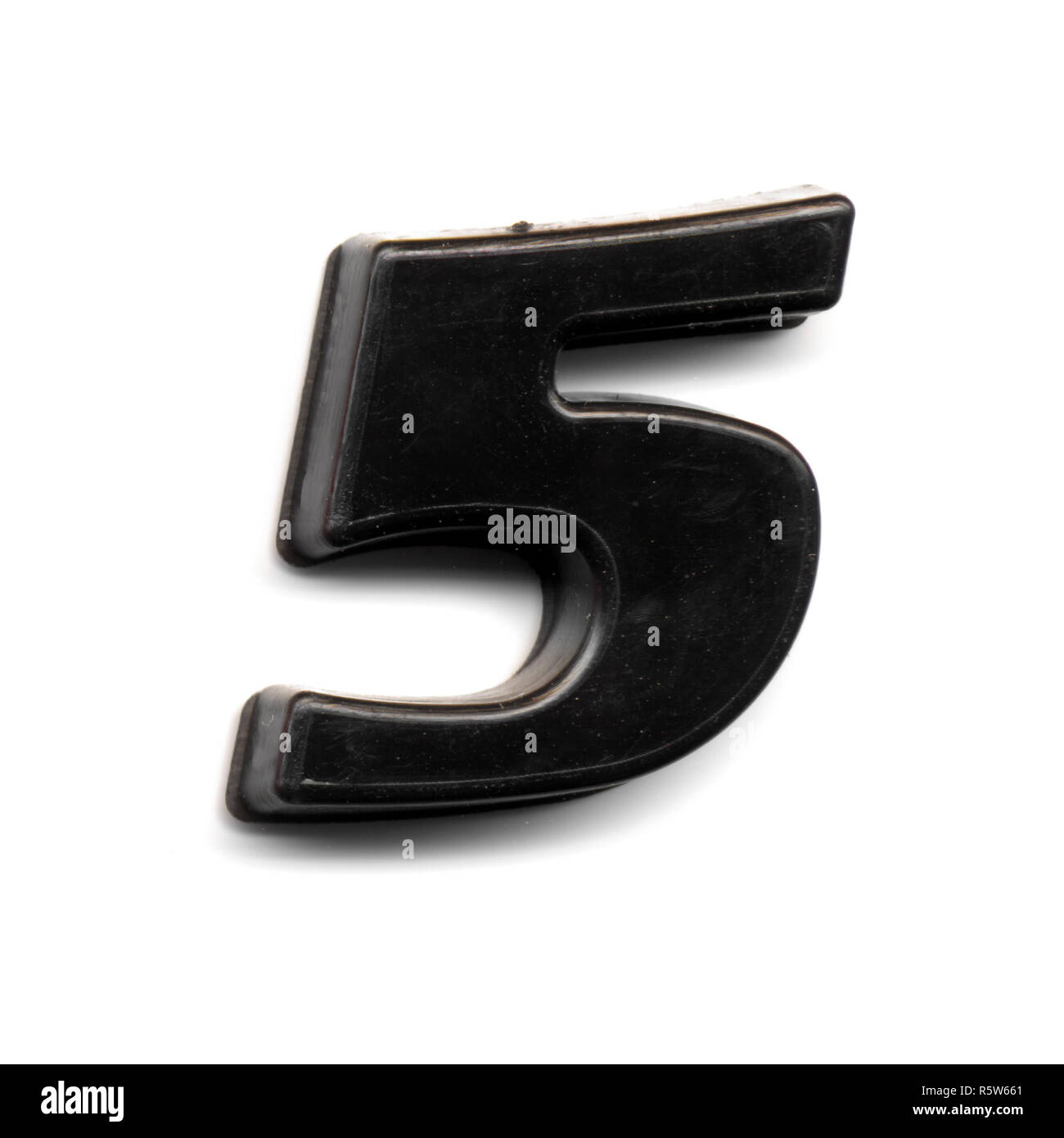 Plastic magnetic number 5 Stock Photo - Alamy