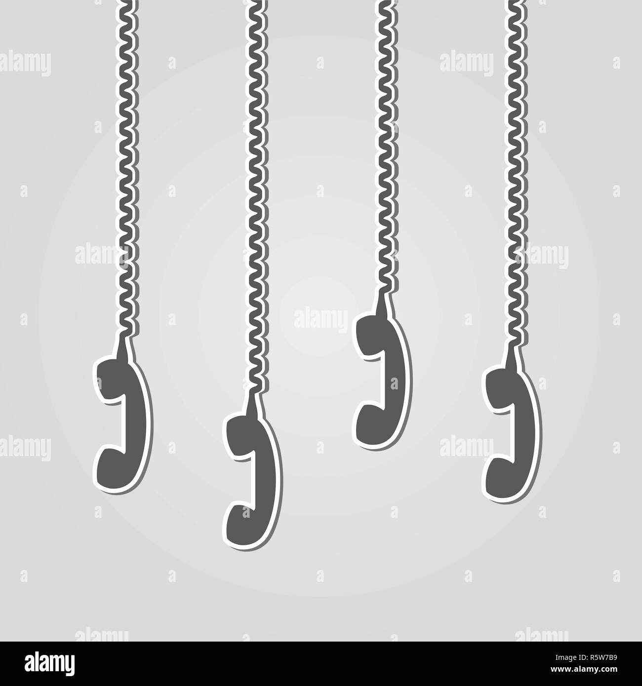 Retro phone receivers hanging on cables. Gray background. On hold, on ...