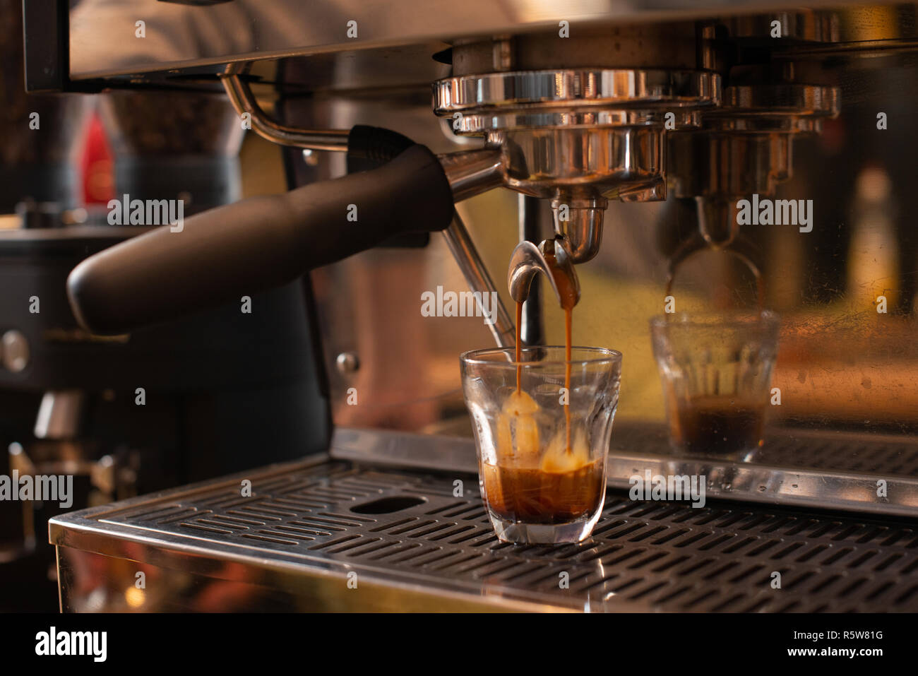 espresso machine pouring espresso, barista on work, cafe scene, making ...