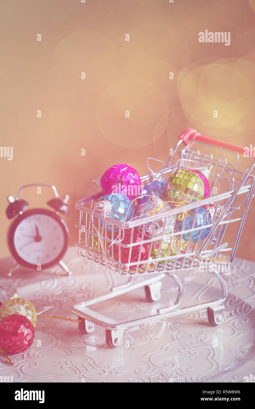 Christmas decorations in shopping trolley, retro toned Stock Photo - Alamy