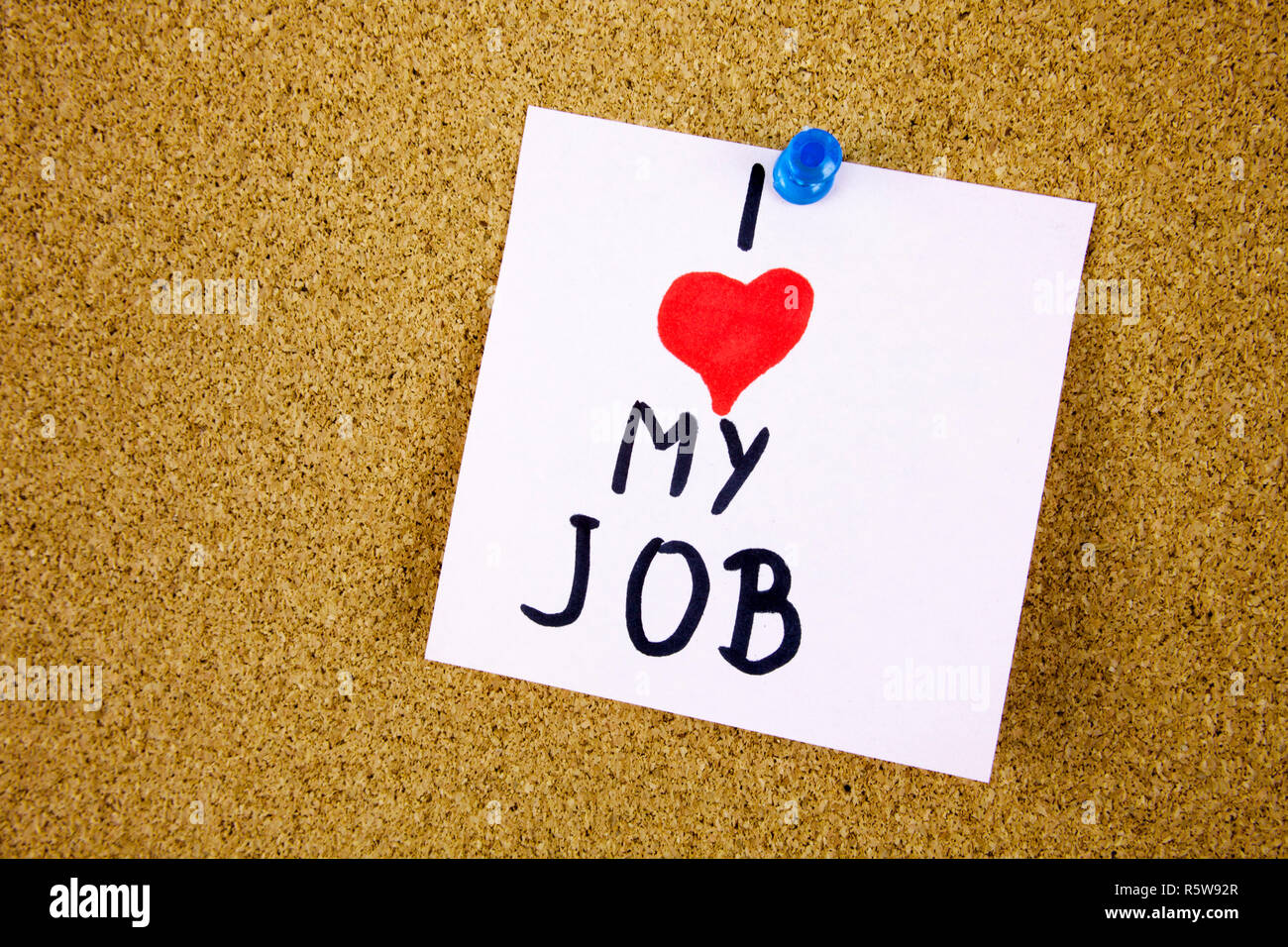 i love my job note adhesive note on over cork board background Stock ...