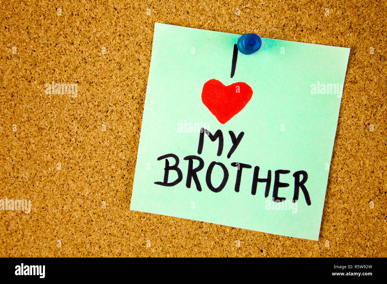 i love my brother text on sticky note over notice board. room for text ...