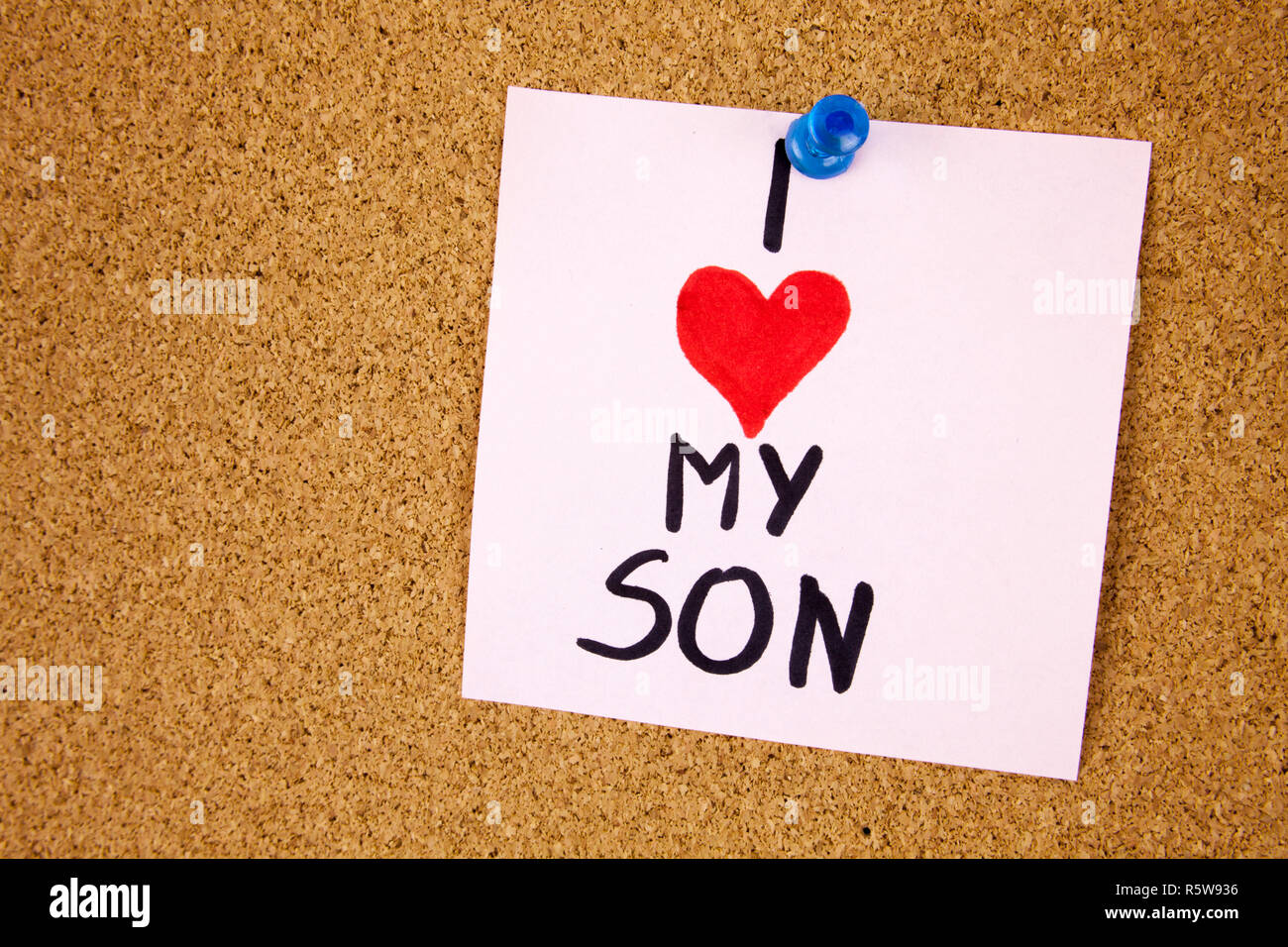 Note with I love my son. Note with I love my son and red heart on cork ...