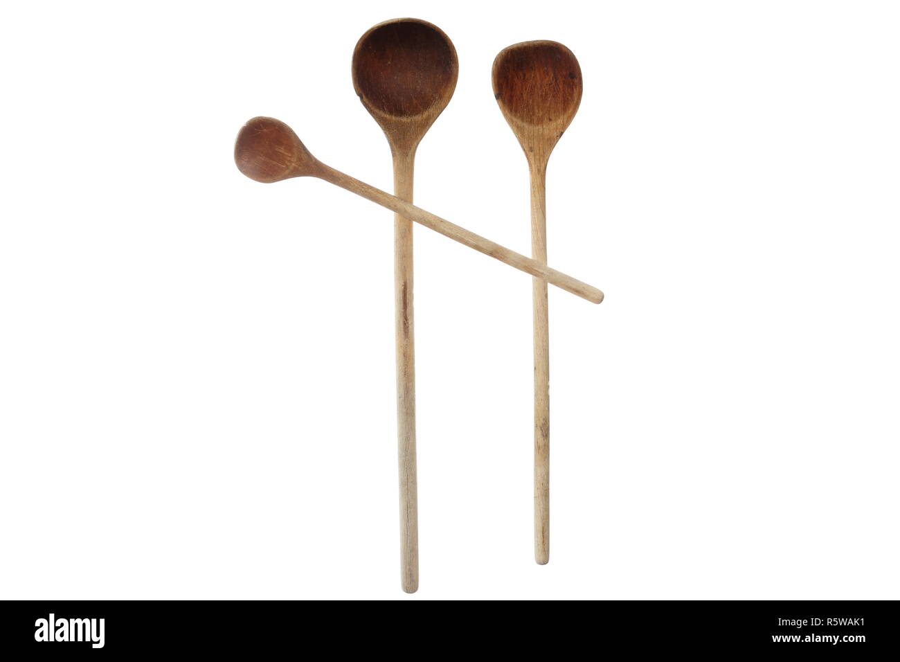 three wooden cooking spoons Stock Photo - Alamy