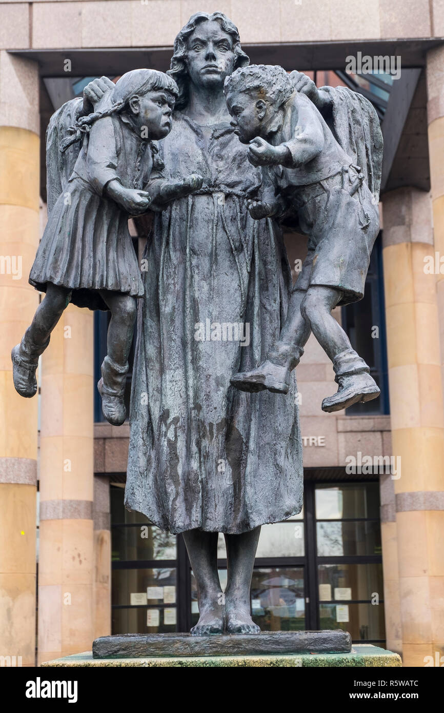 The Scales of Justice statue depicts two urchins being held by the ...