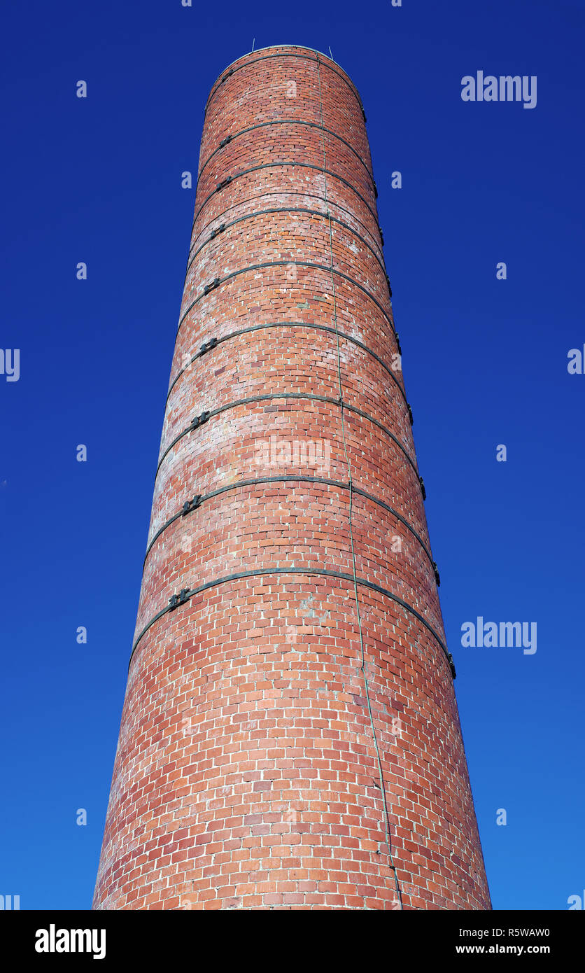 Tall brick industrial chimney hi-res stock photography and images - Alamy
