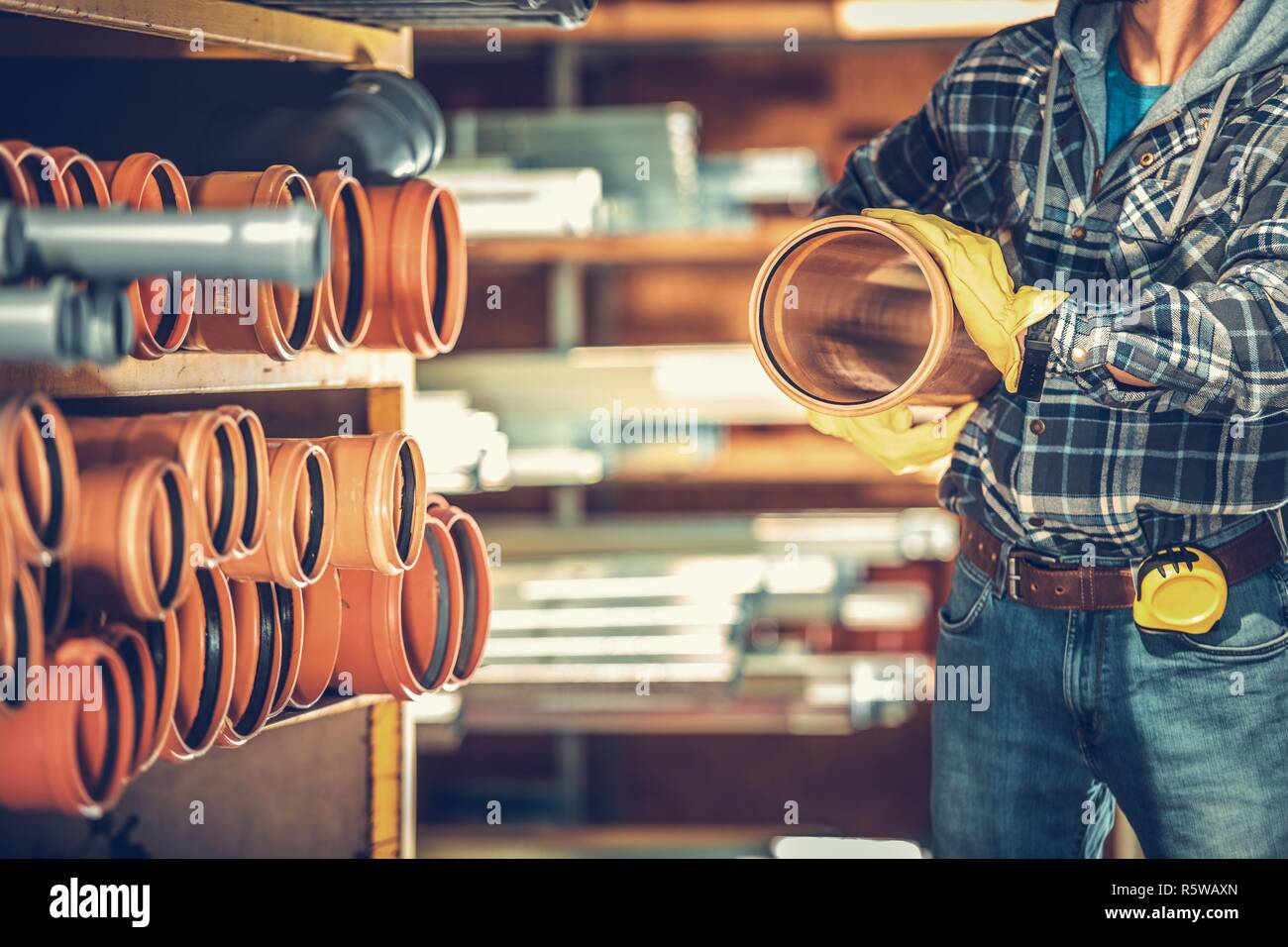 Residential Septic System Plastic Pipes. Construction Worker with a ...