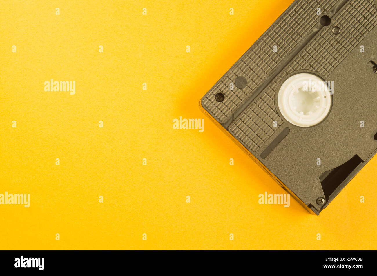 VHS video tape cassette isolated on yellow background Stock Photo - Alamy